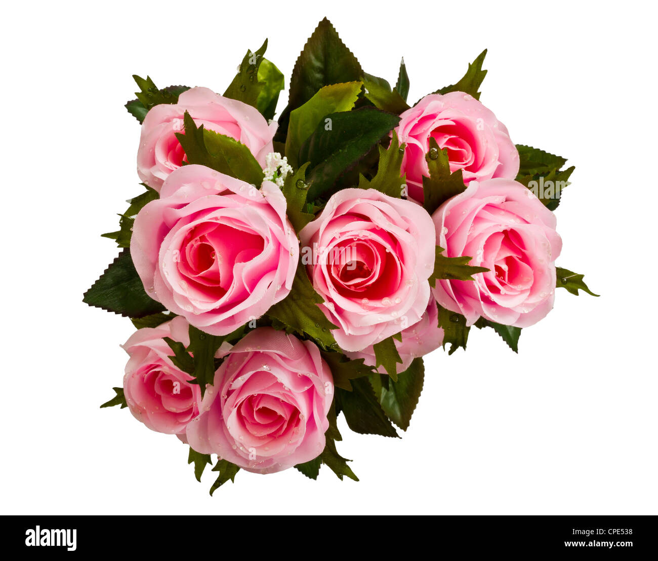 Artificial pink rose on white background Stock Photo - Alamy