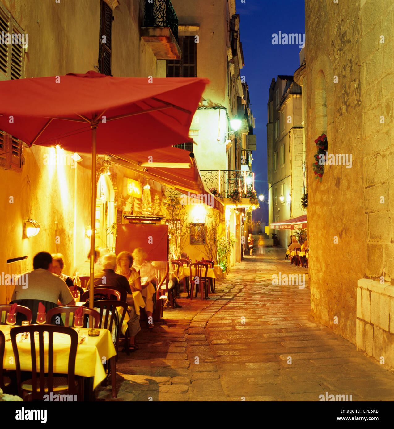 Evening restaurant scene in Haute Ville, Bonifacio, South Corsica ...