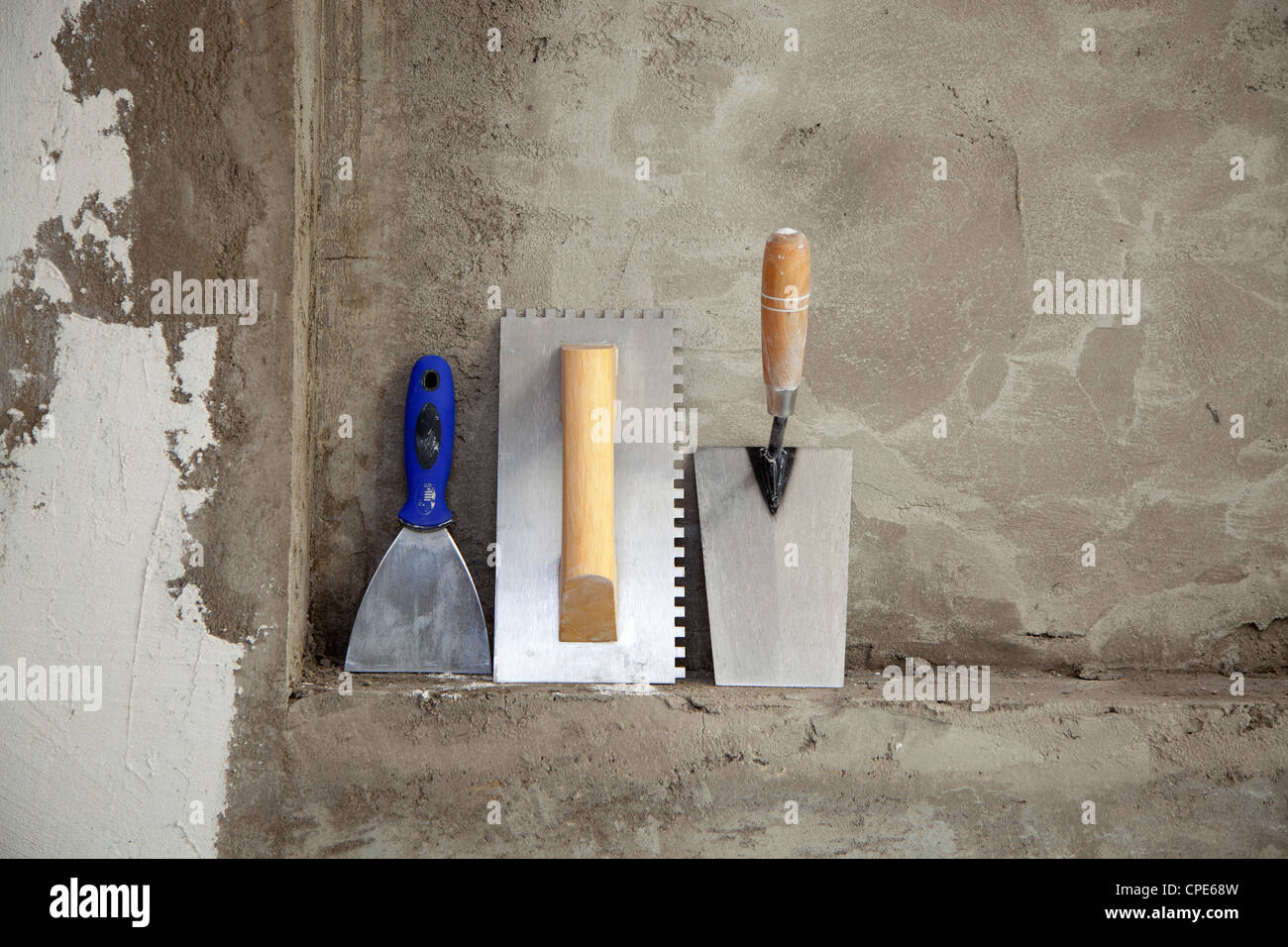 construction stainless steel trowel tools and spatula on cement mortar ...