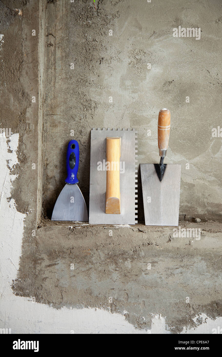 construction stainless steel trowel tools and spatula on cement mortar ...