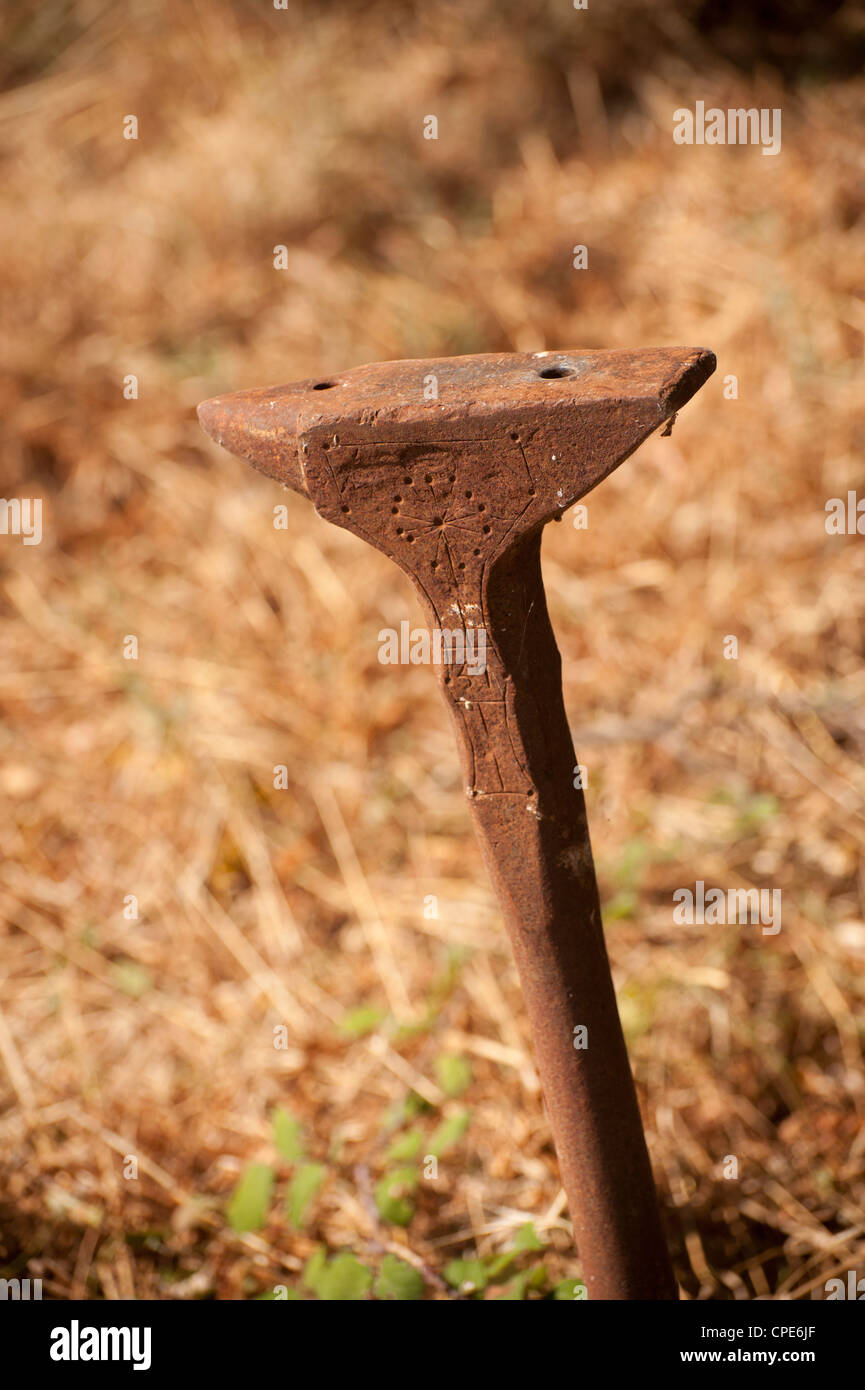 small portable anvil standing in the ground Stock Photo - Alamy