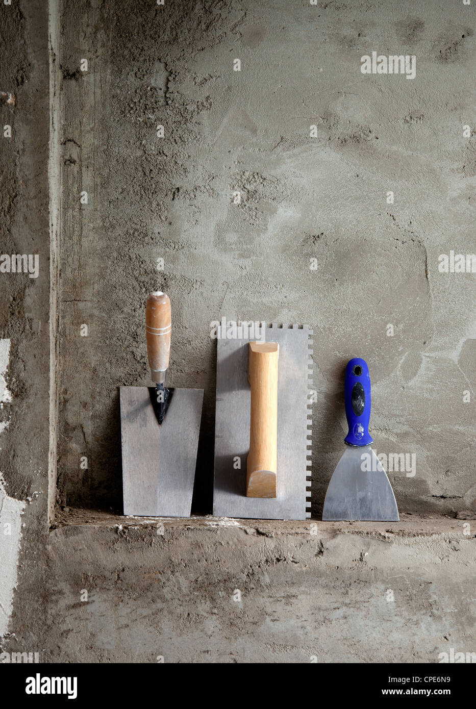 construction stainless steel trowel tools and spatula on cement mortar ...