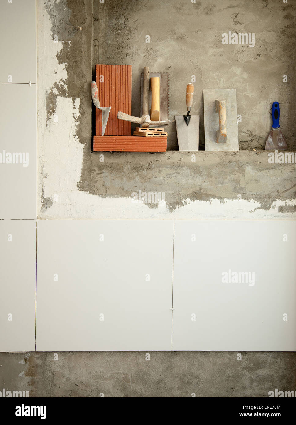 Construction mason cement mortar tools in a row Stock Photo - Alamy