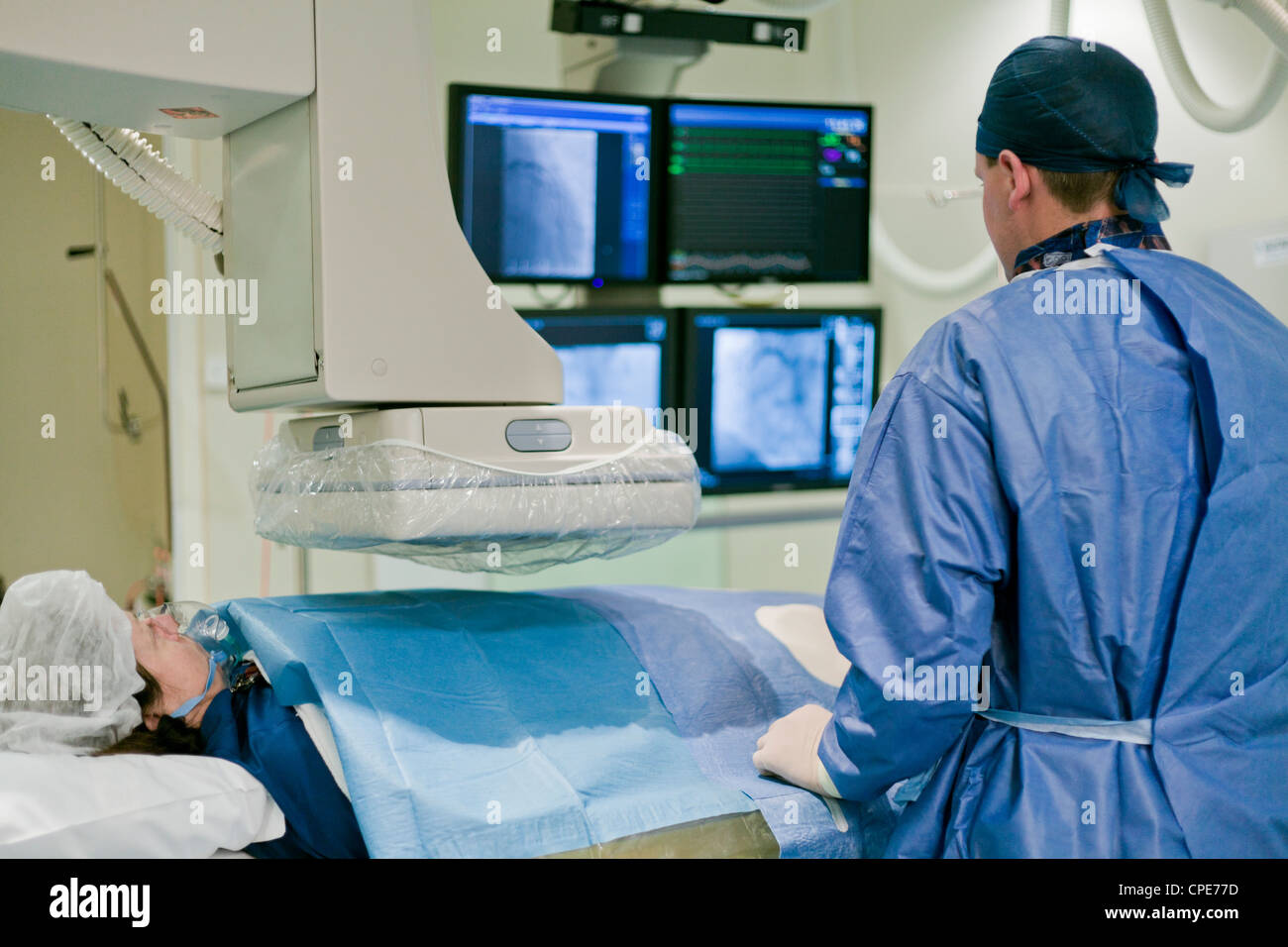 Cathlab in modern hospital with doctor and patient Stock Photo - Alamy