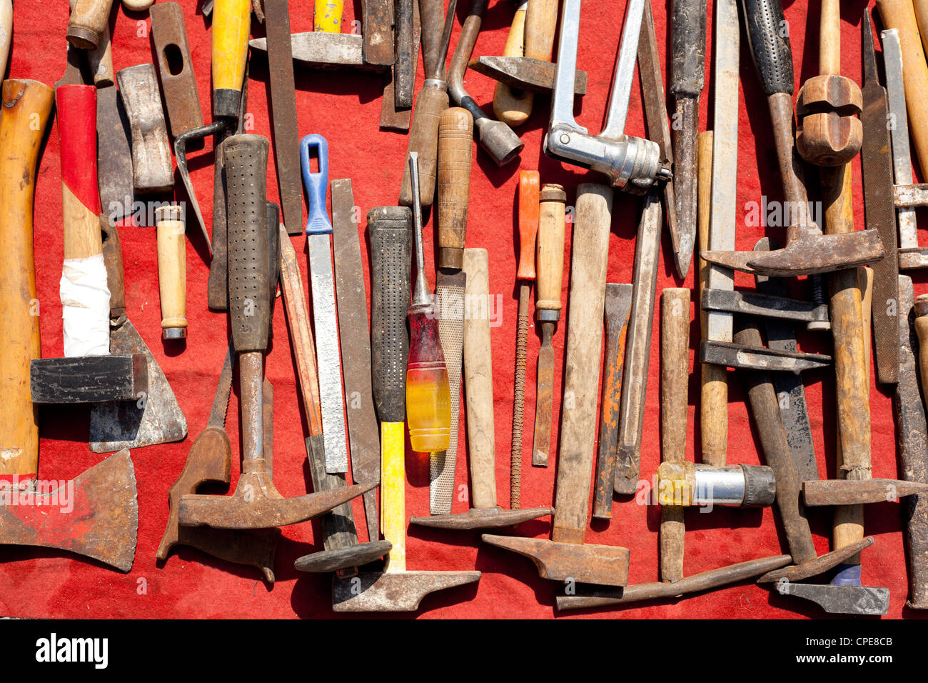 hand tools used rusty iron aged and grunge on a red background Stock ...