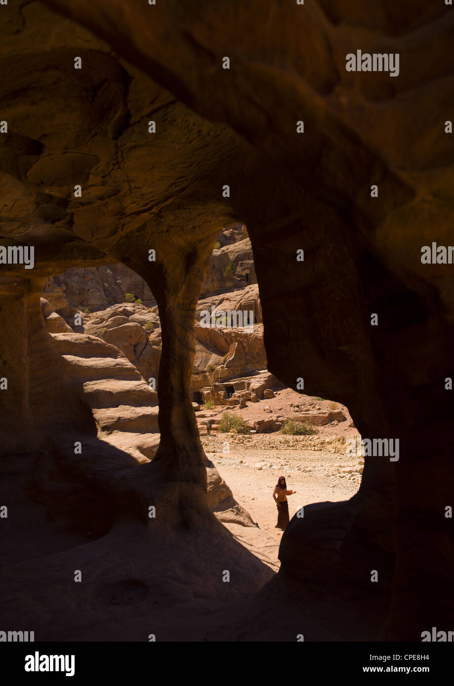 Cave With Roman Amphitheatre In The Background, Petra, Jordan Stock ...