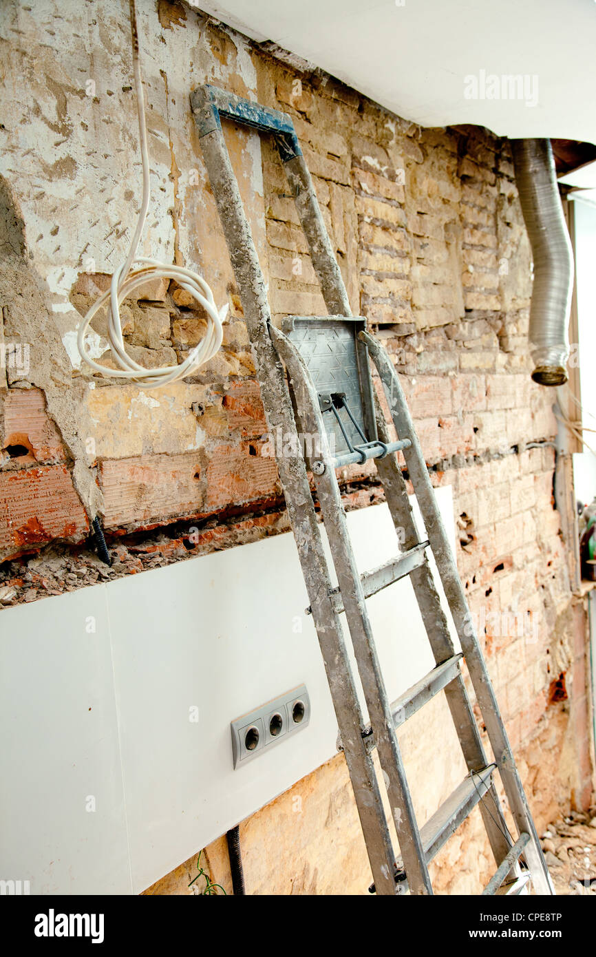 demolition debris in kitchen interior construction and ladder Stock ...