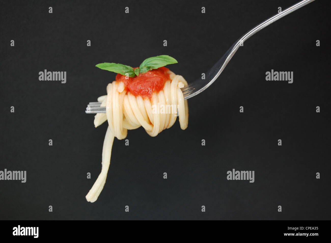 Spaghetti on a fork Stock Photo - Alamy