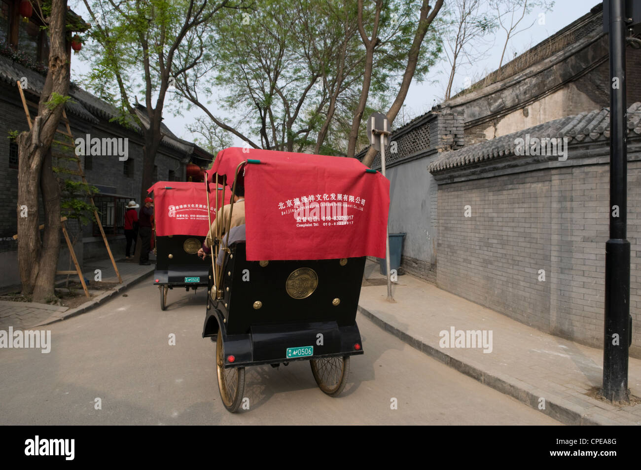 Rickshaw drivers take tourists for Hutong tour, Beijing, China Stock ...