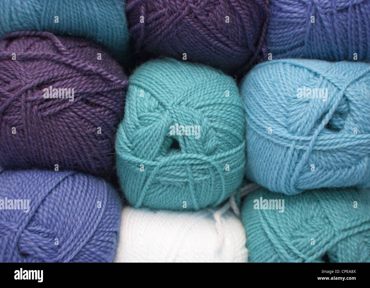 background with many yearn balls with matching colors Stock Photo - Alamy