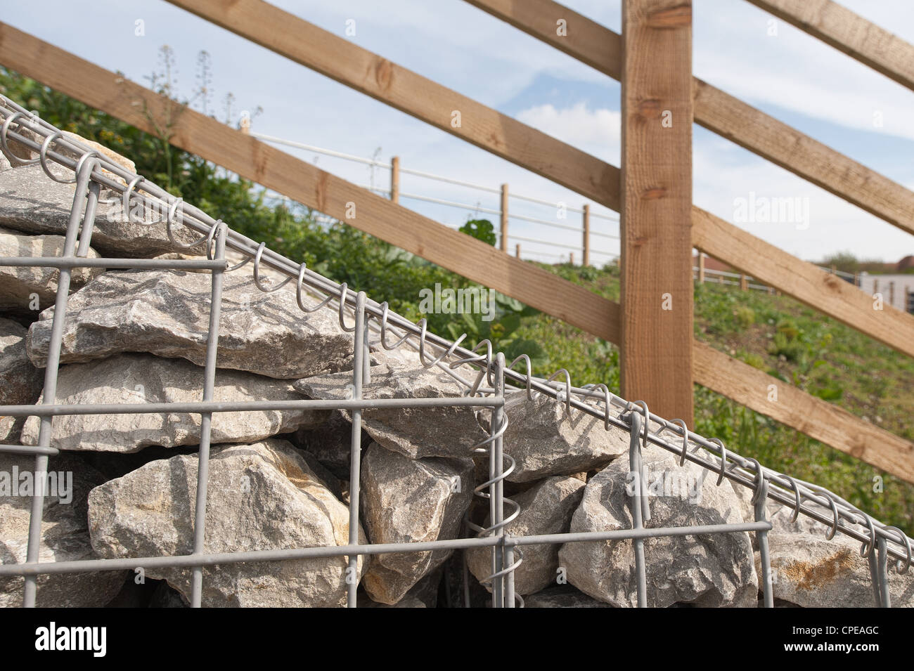 Caged rock riprap in stainless steel frames used as a structural ...