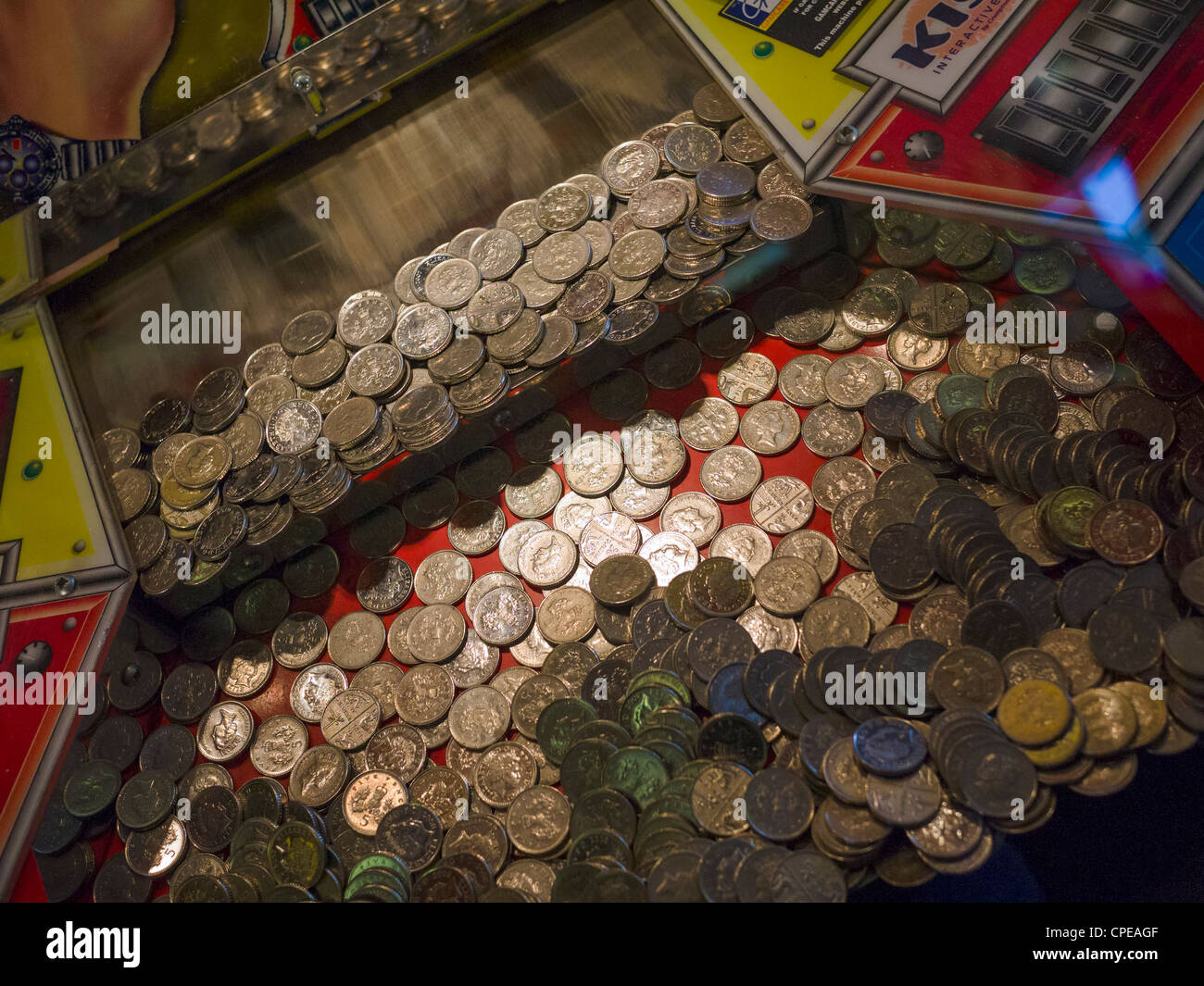 Amusement arcade game money hi-res stock photography and images - Alamy
