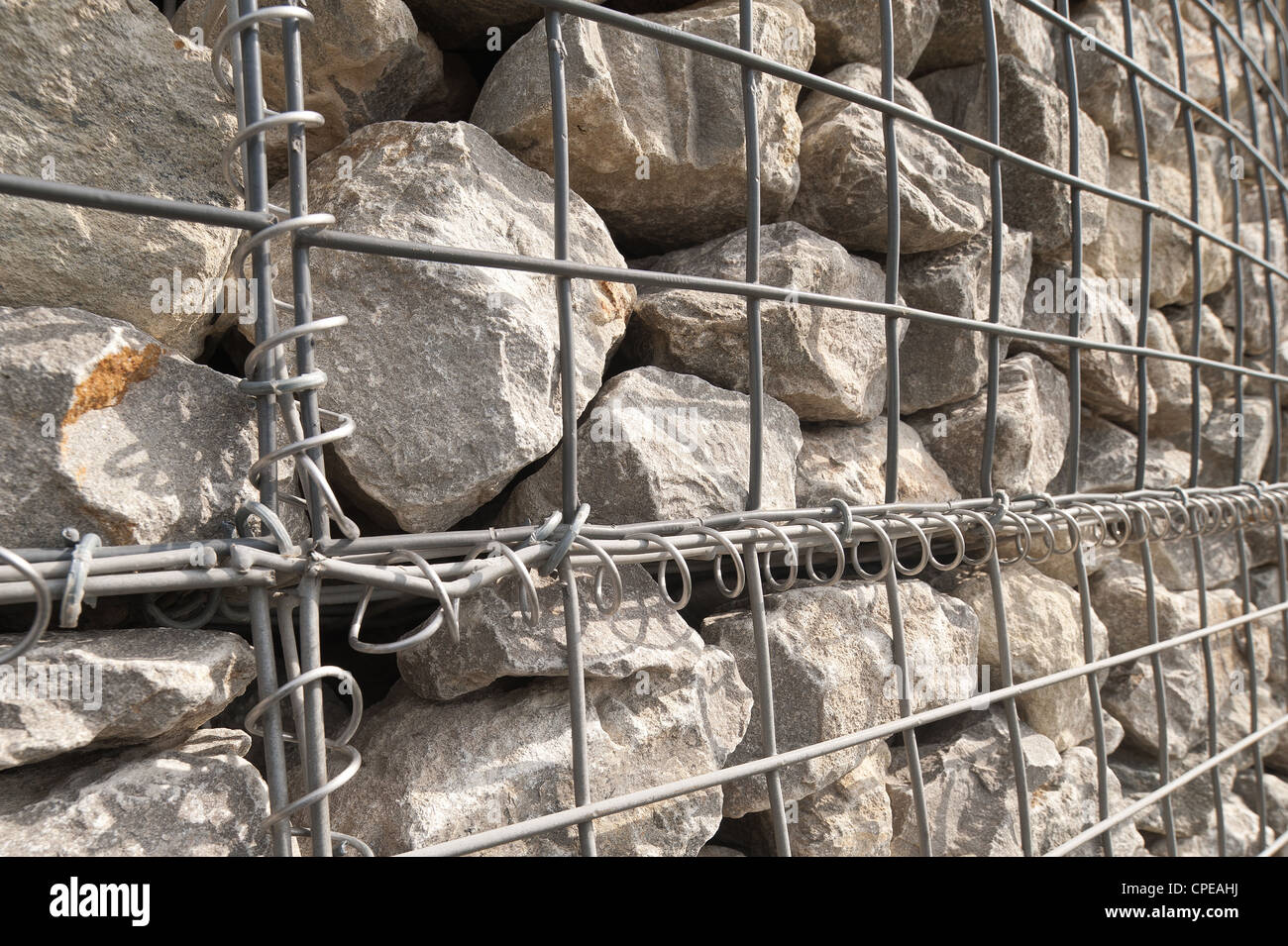 Caged rock riprap in stainless steel frames used as a structural ...