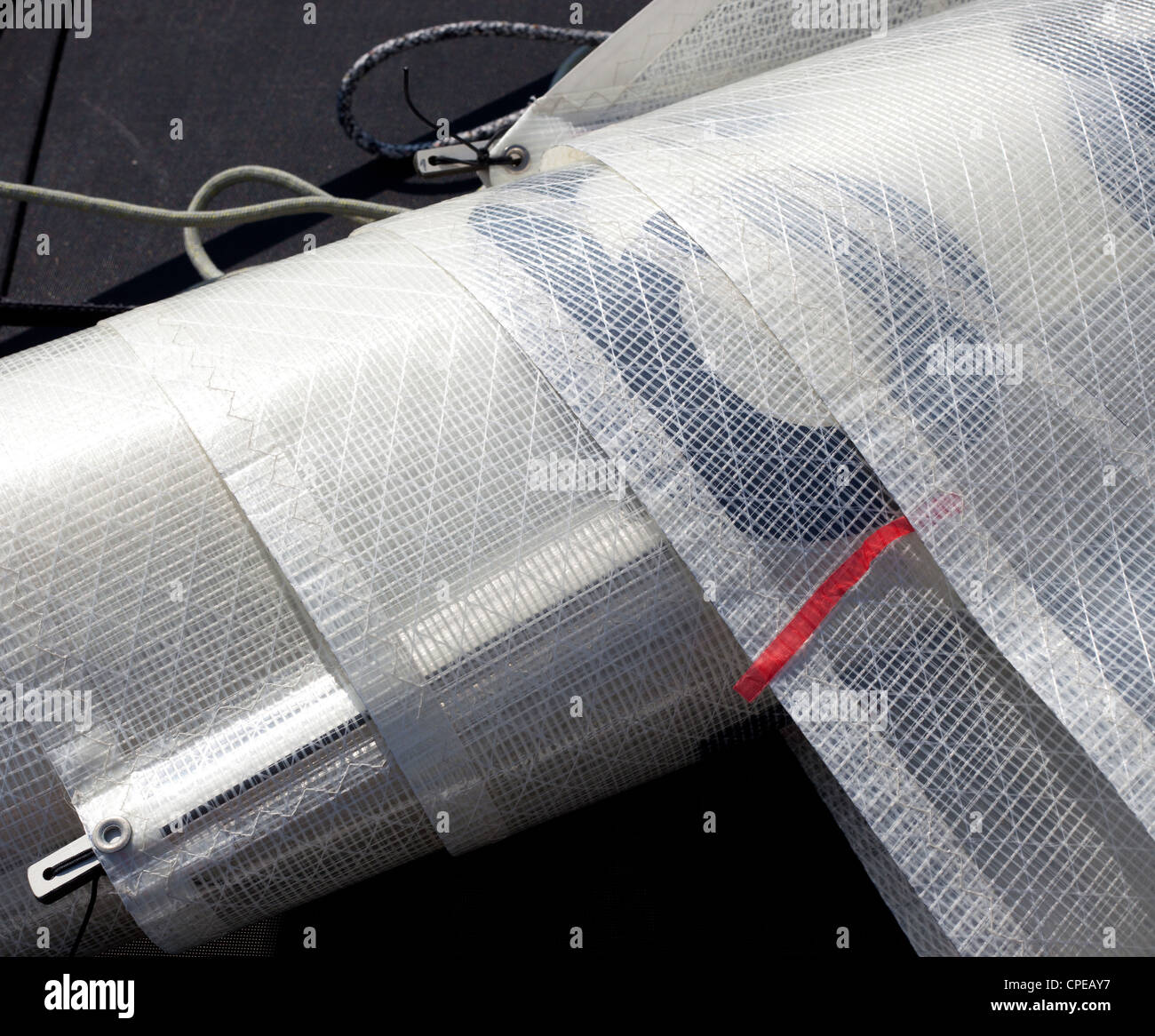 Fiber sail rolled detail macro texture on sailing marina Stock Photo ...