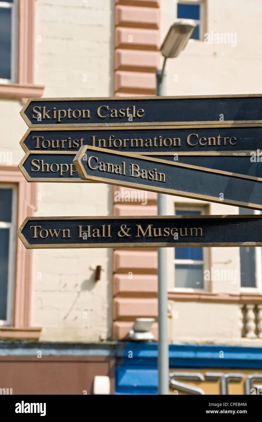 Close up of tourist information signpost sign signs Skipton town centre ...