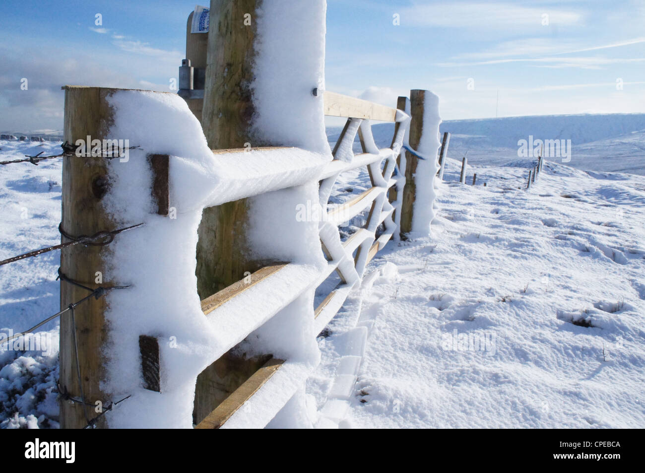 Snow formed against a fence Stock Photo - Alamy