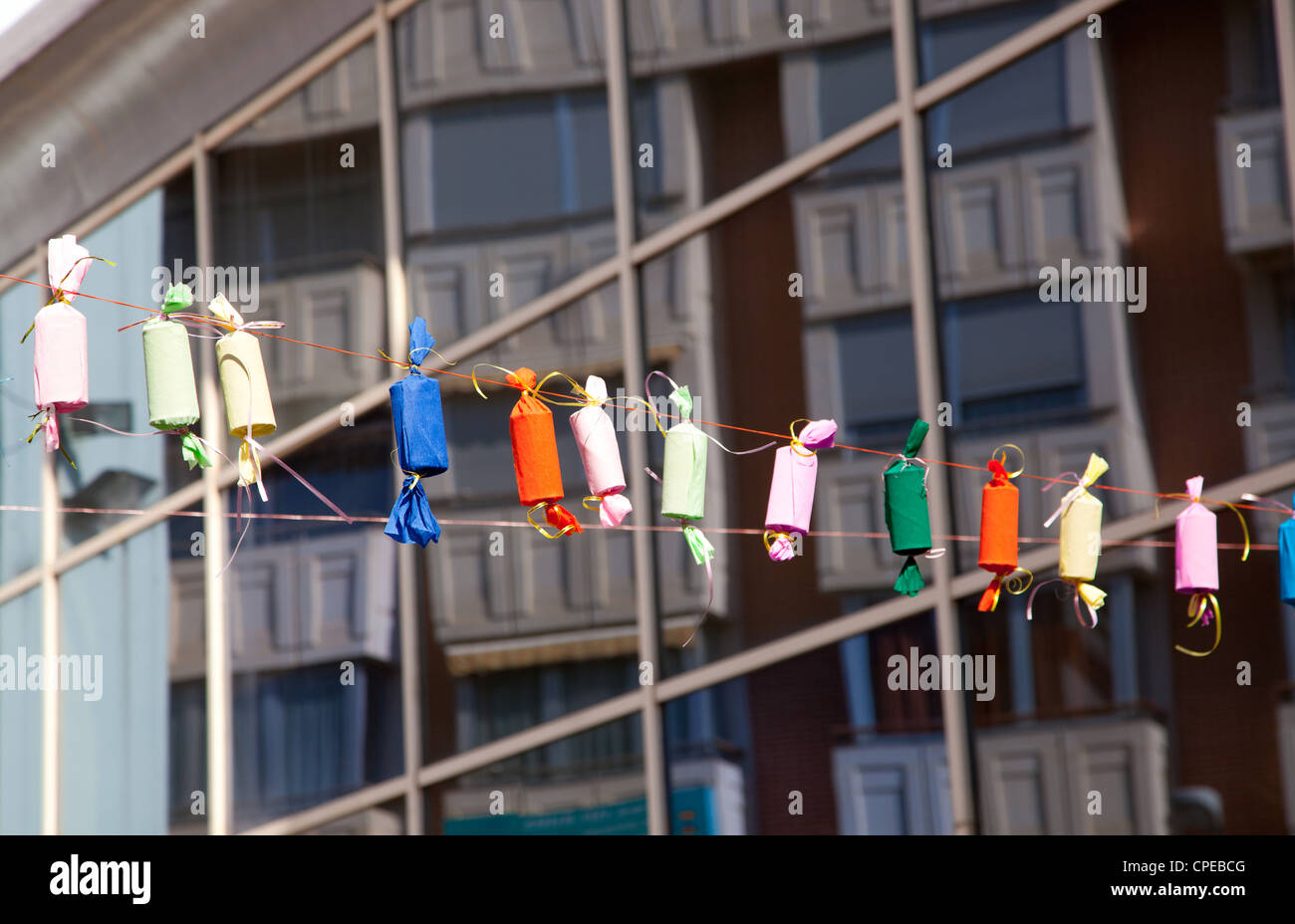 Fallas decoration fake fireworks colorful in a row rope Stock Photo - Alamy