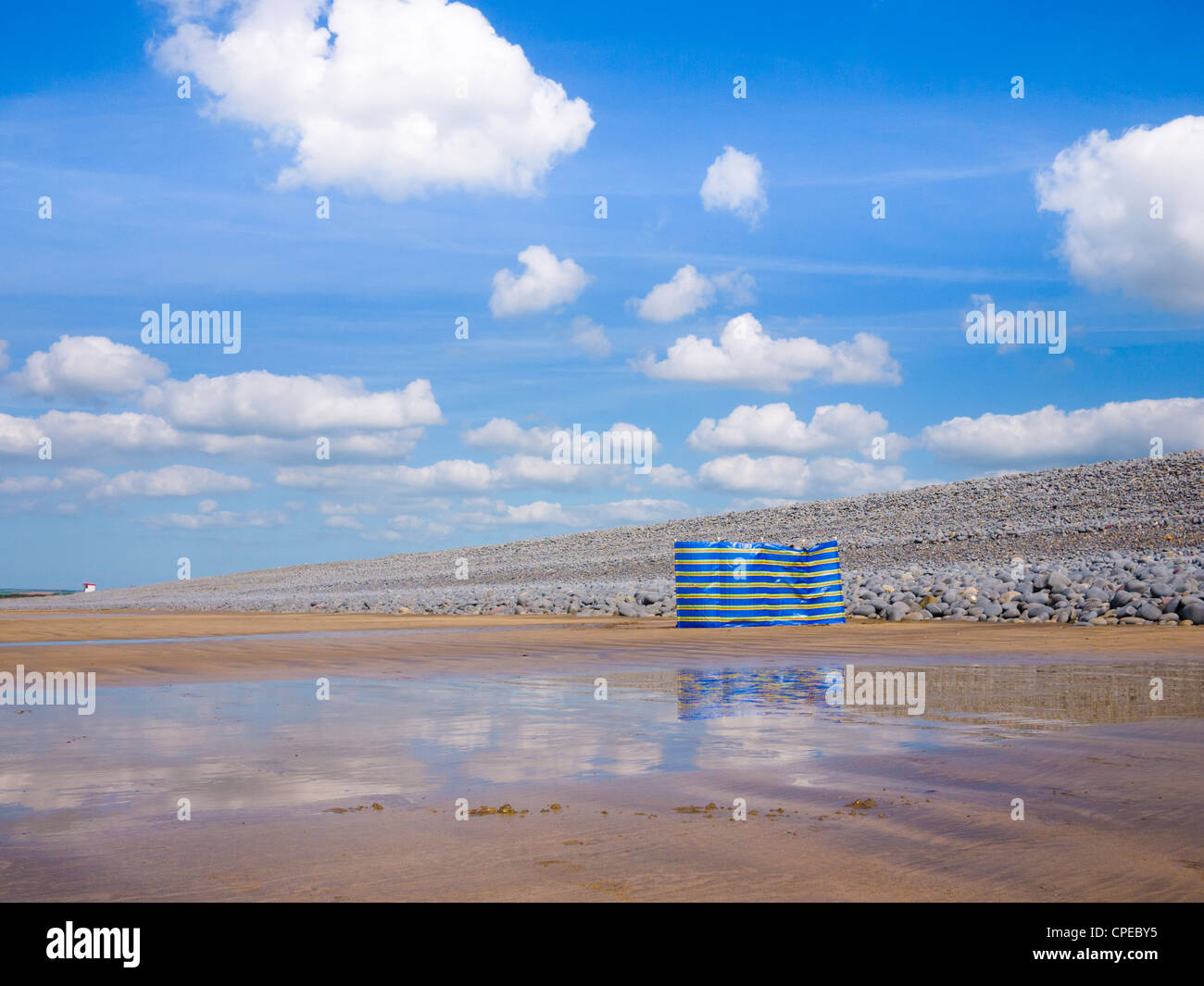 A windbreak beside the pebble ridge at Westward Ho!, Devon, England ...