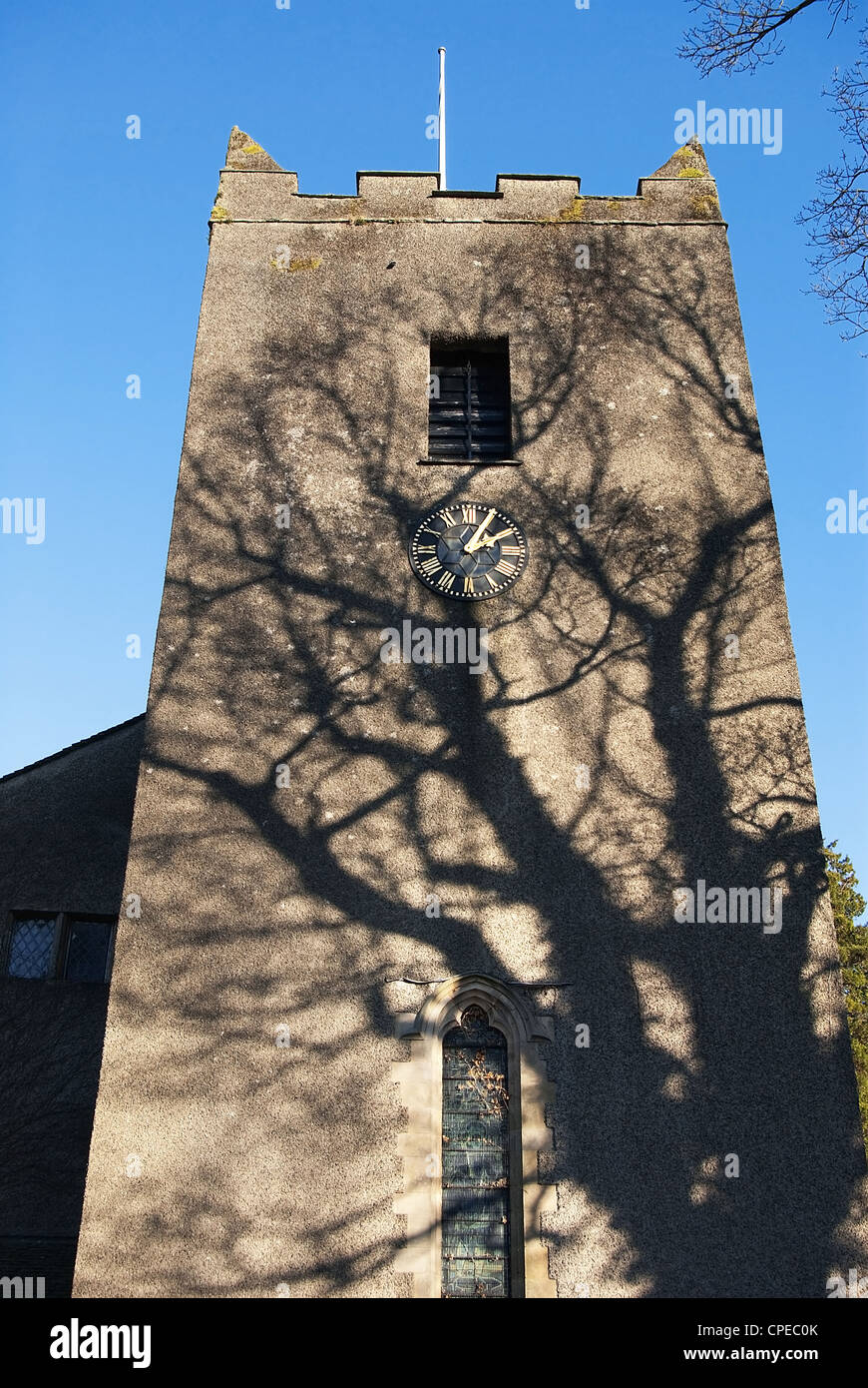 St Oswald's Church Grasmere Cumbria in winter with late afternoon sun ...