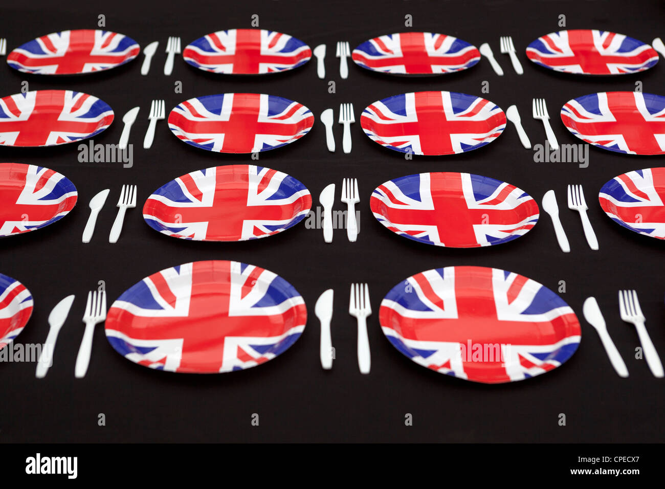 Union Jack Plates with Plastic Cutlery on black background Stock Photo ...