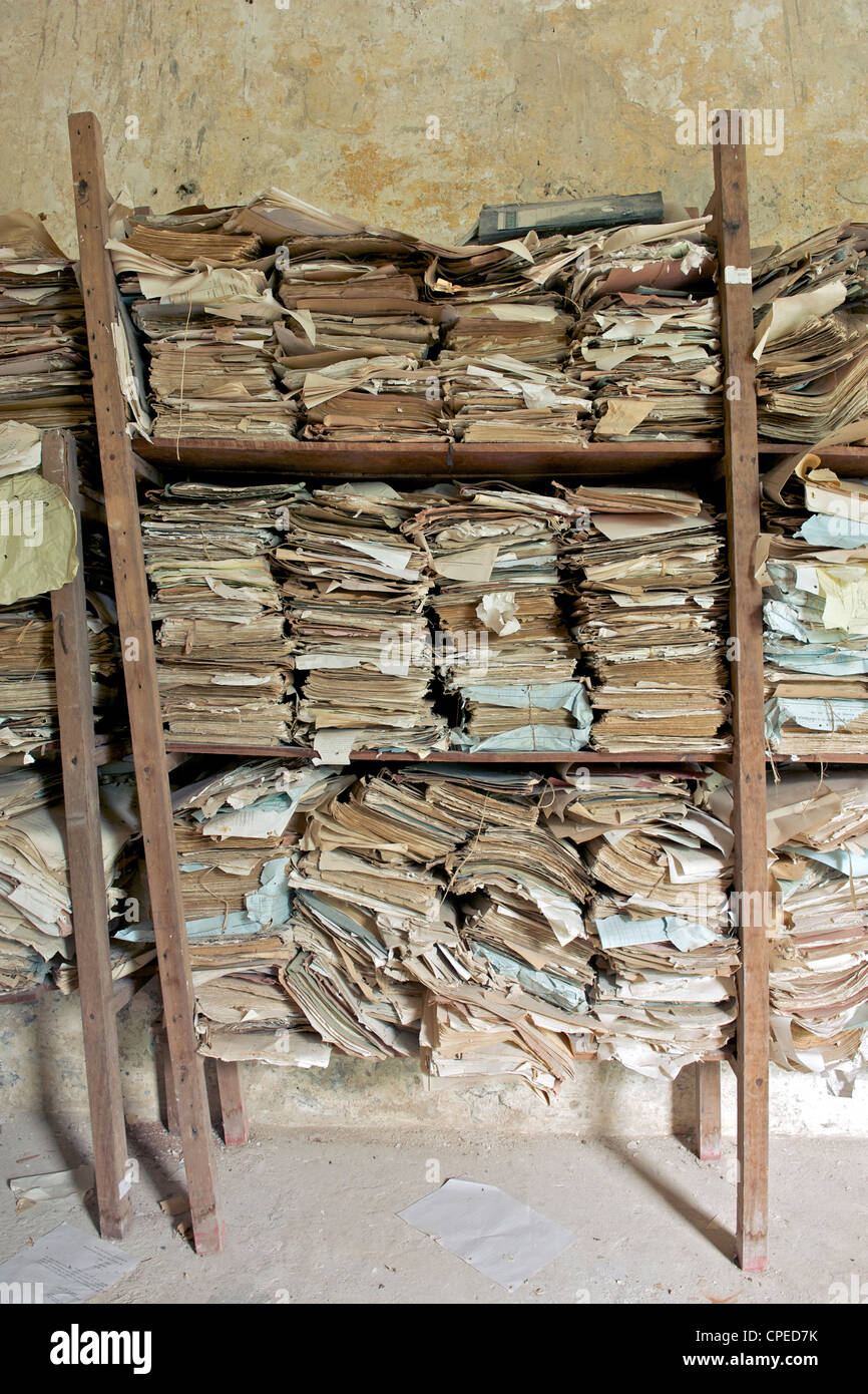 Rickety wooden shelves filled with old documents Stock Photo - Alamy