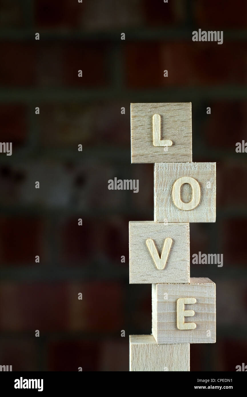 The wooden building blocks of love Stock Photo - Alamy