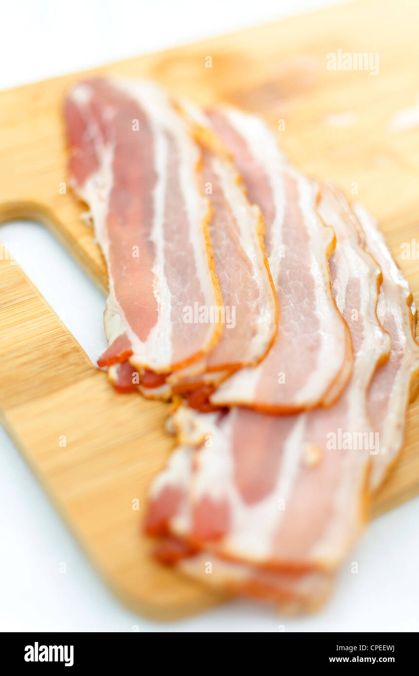 bacon on the cutting board Stock Photo - Alamy
