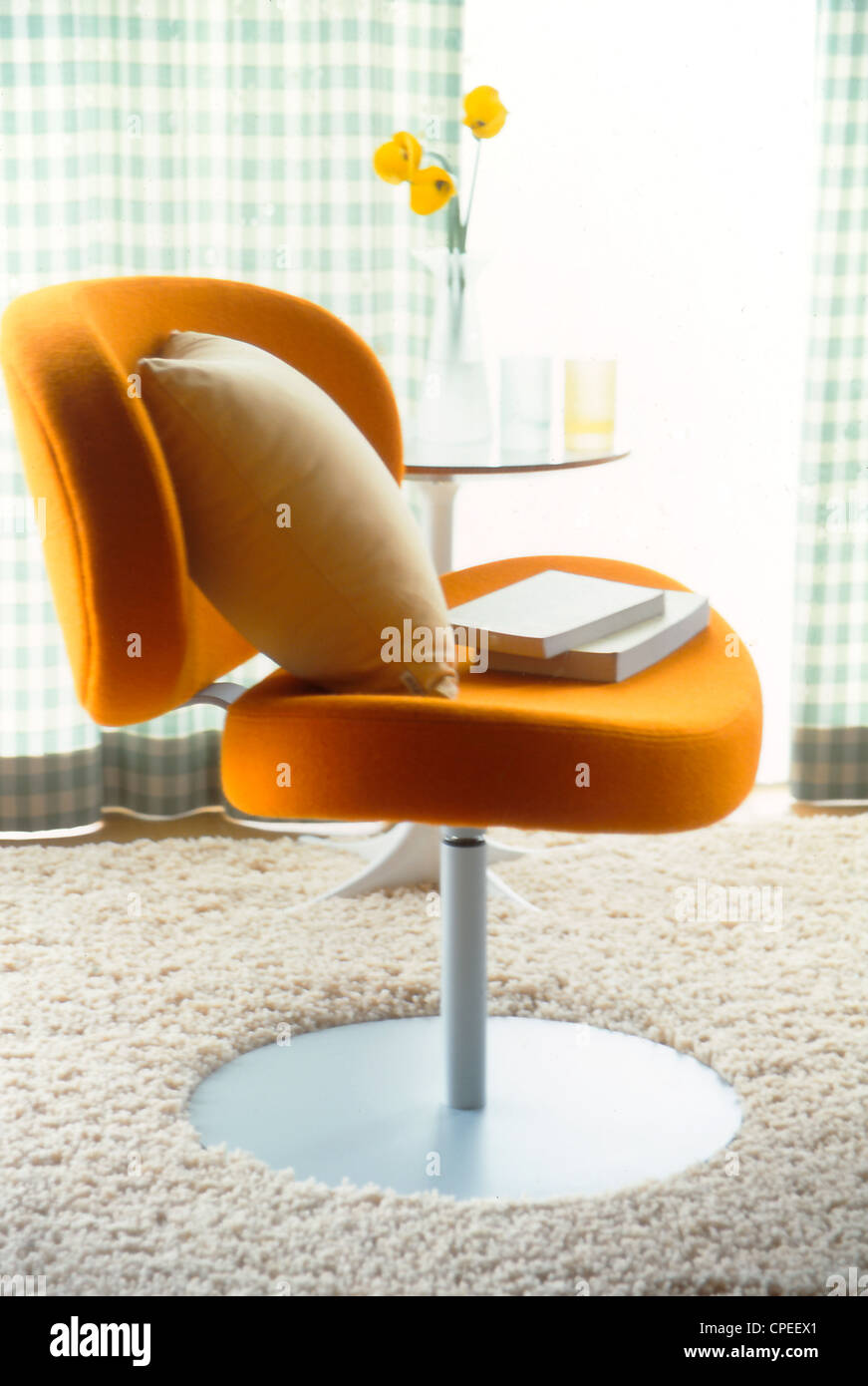 Modern Easy Chair With Cushion Placed On Rug Stock Photo - Alamy