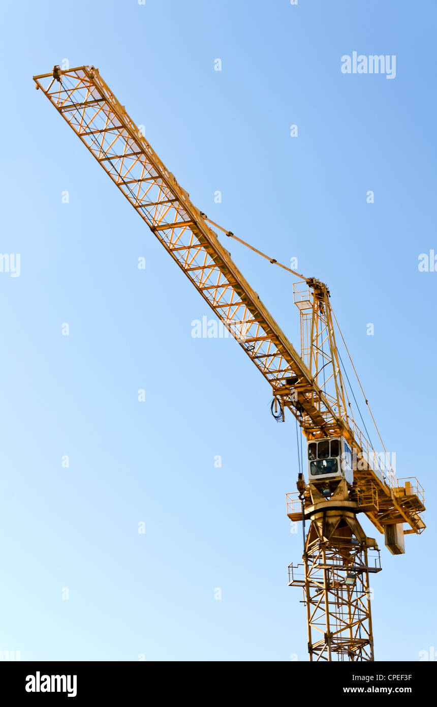 Tower crane against blue sky hi-res stock photography and images - Alamy