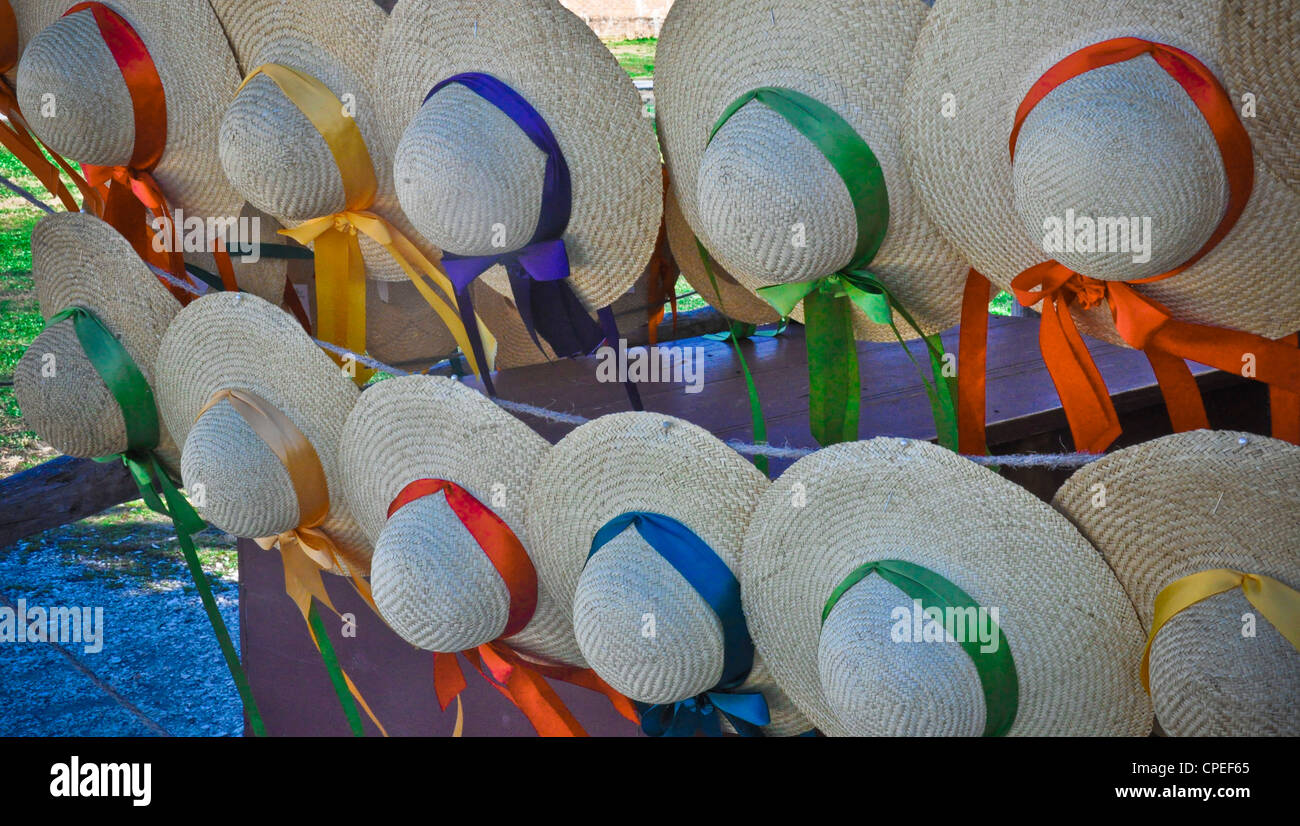 assorted straw hats display for sale Stock Photo - Alamy