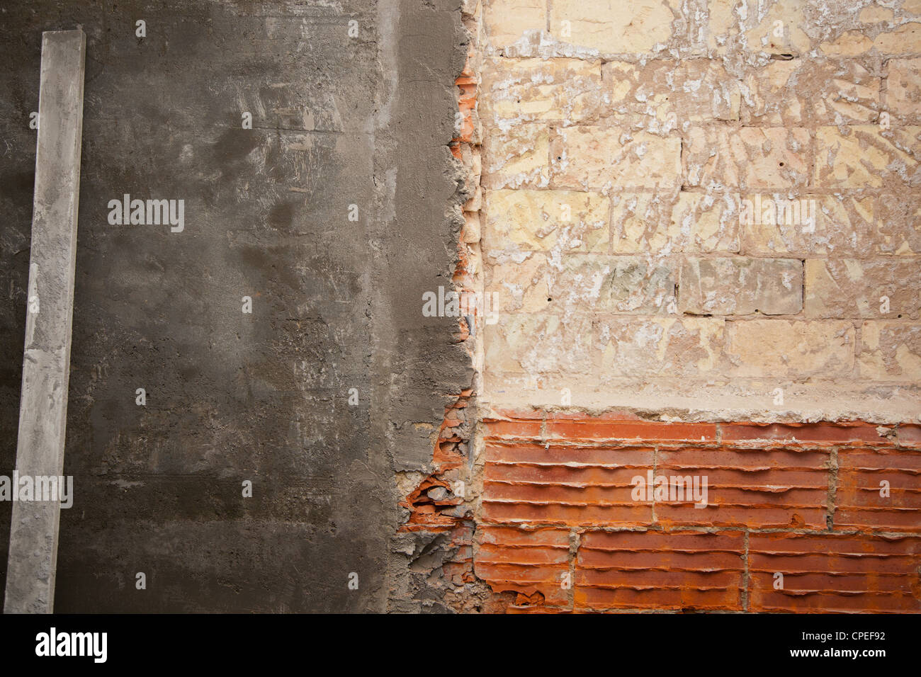 Brickwall construction cement plaster rulers hi-res stock photography ...