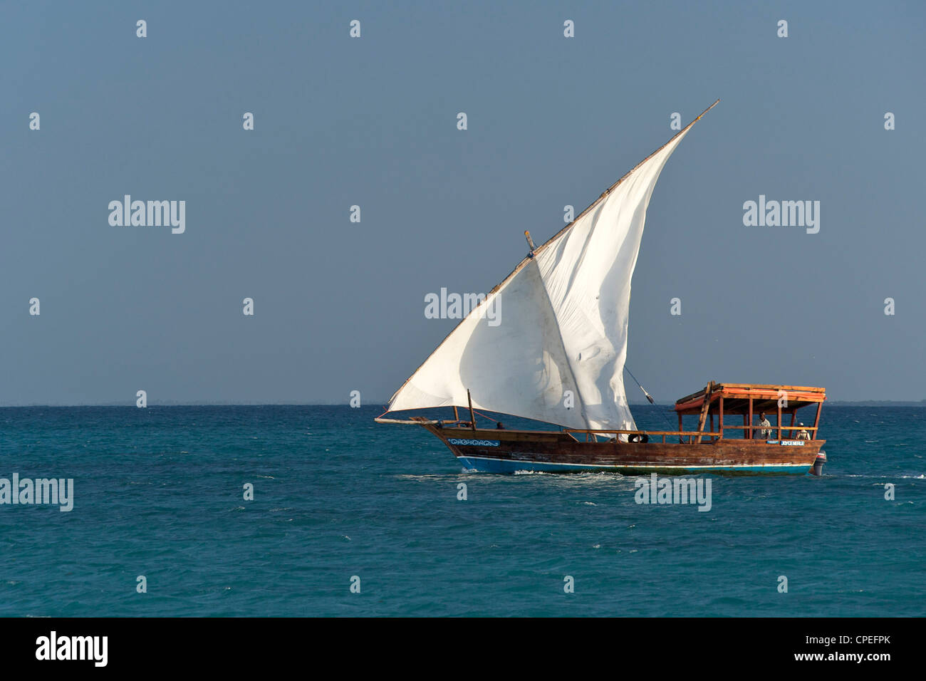 Dhow sailing in the Quirimbas archipelago off the coast of northern ...