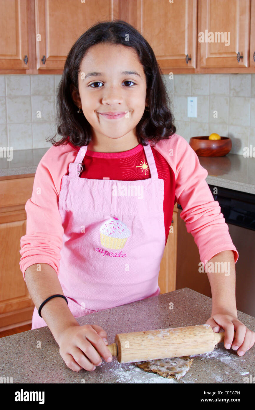 Girl baking chocolate chip cookies in the kitchen Stock Photo - Alamy