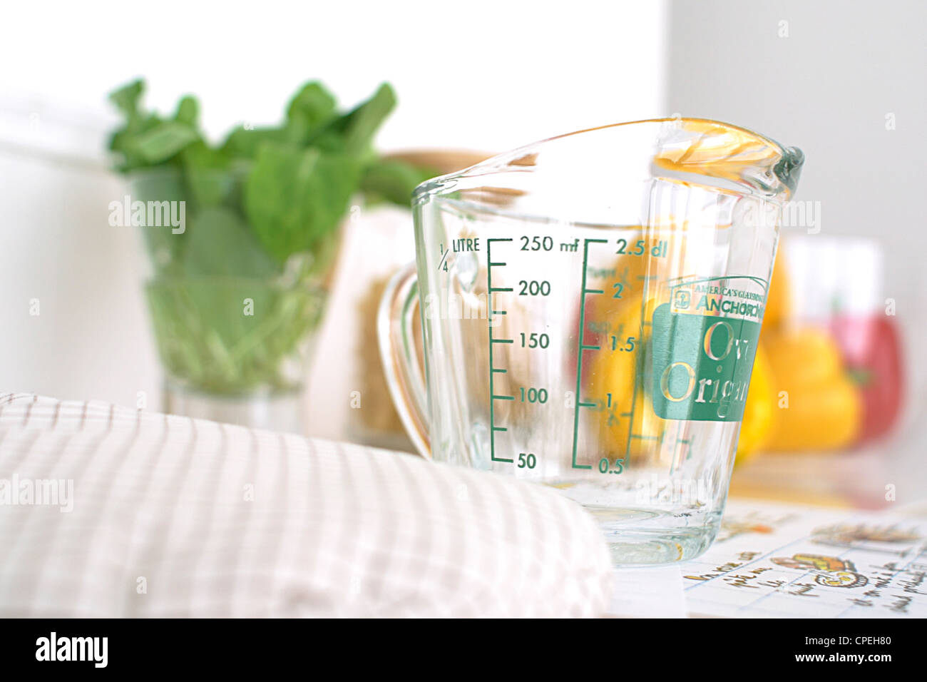 Measuring Jug On Table Stock Photo - Alamy