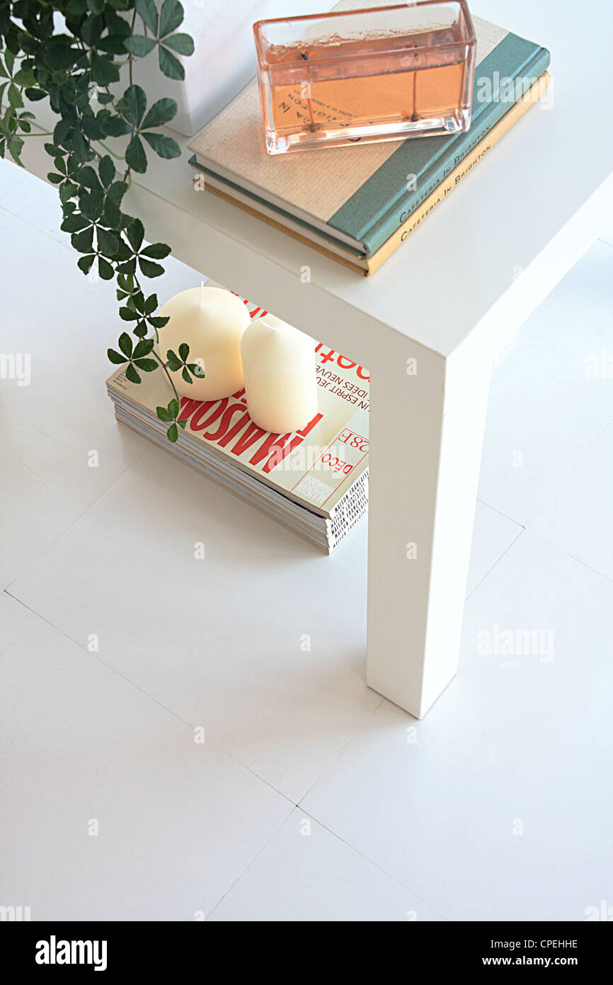 Book under table hi-res stock photography and images - Alamy