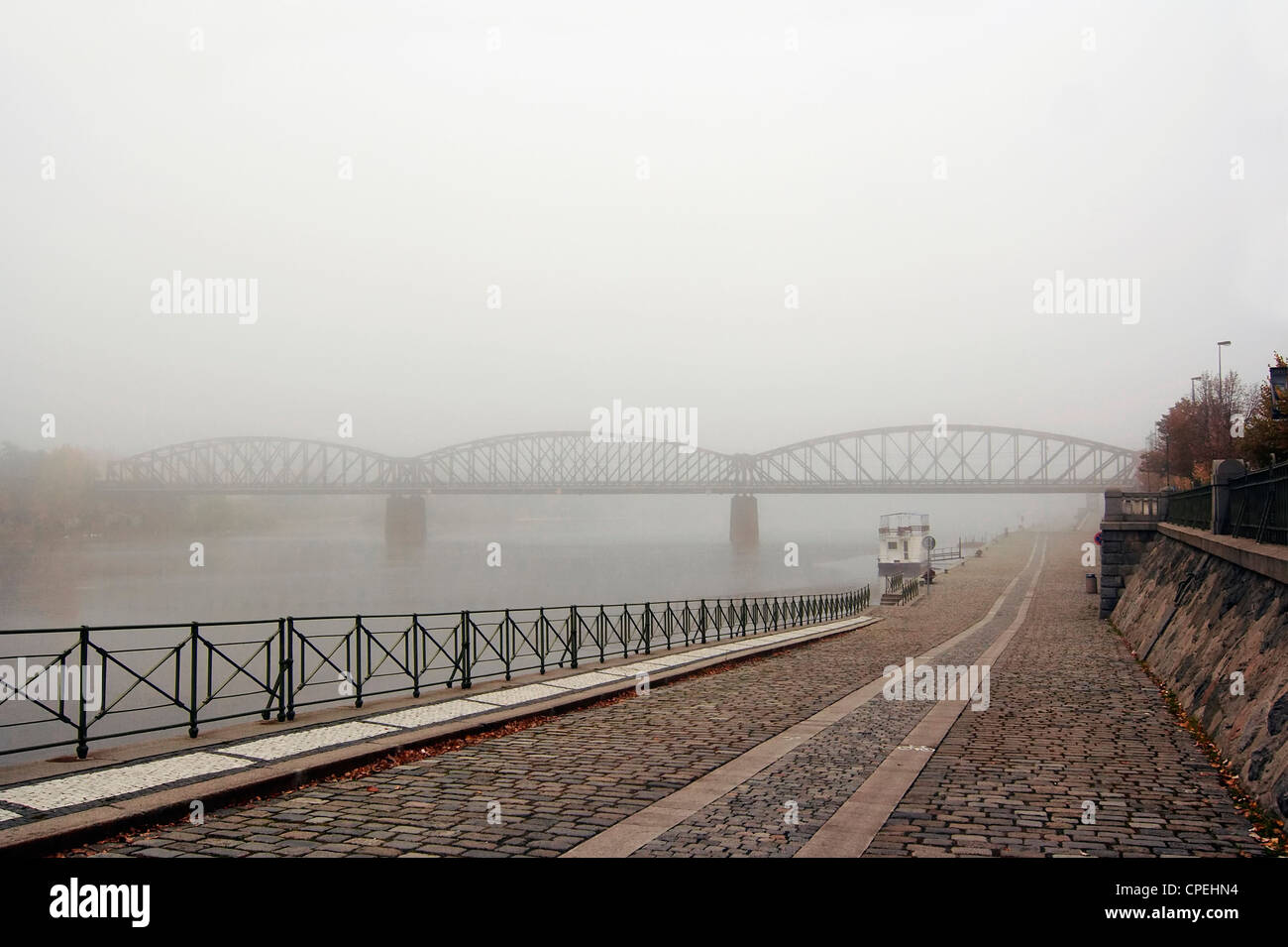 Prague railway bridge in early morning fog Stock Photo - Alamy