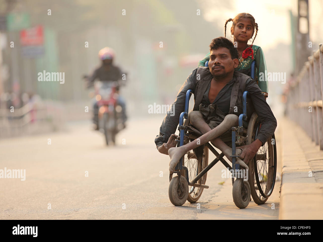 Handicapped men with also handicapped girl helping Kathmandu Nepal ...