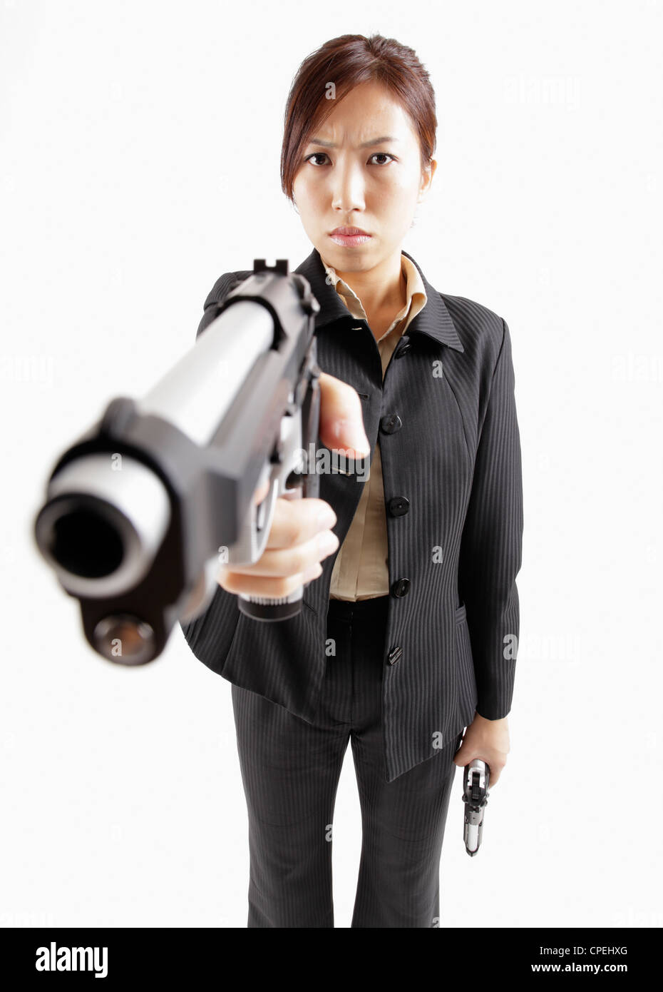 Portrait of office lady playing gun Stock Photo - Alamy
