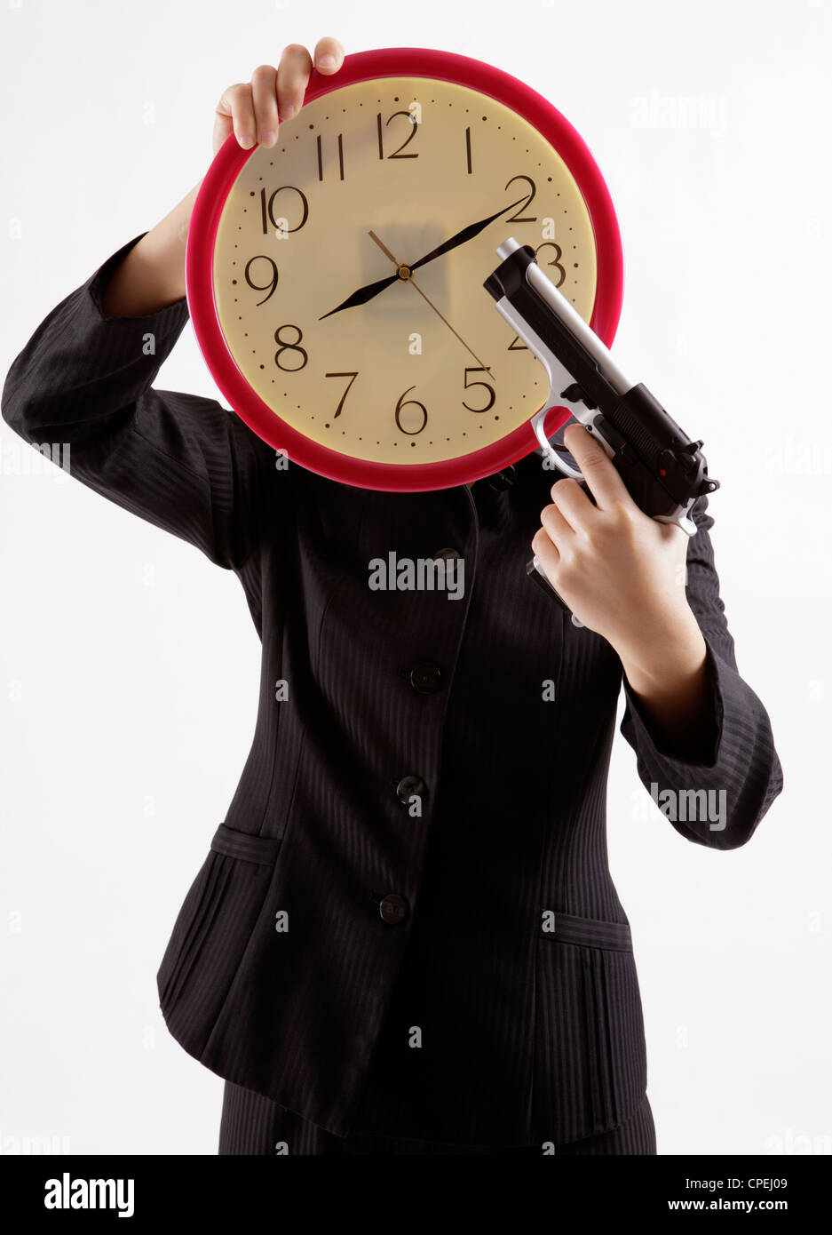 Office lady is tired of working and wants to shoot clock Stock Photo ...