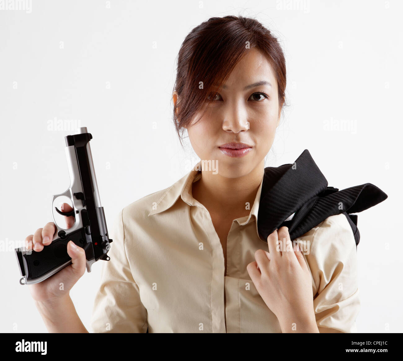 Portrait of office lady playing gun Stock Photo - Alamy