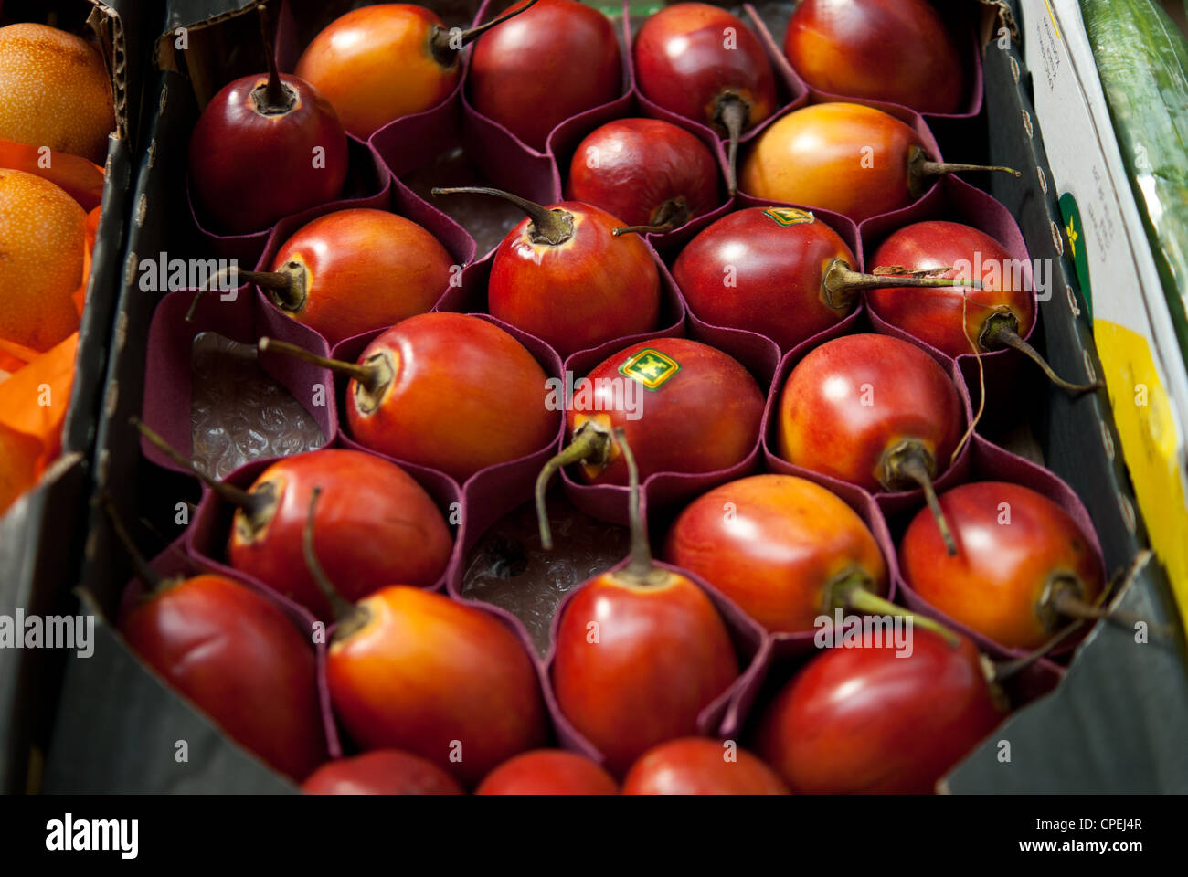 vegetable display exotic fruit red Stock Photo - Alamy