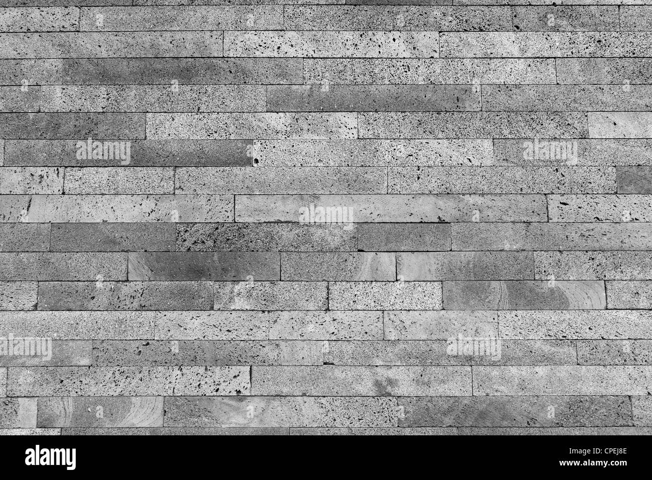 Wall made from basalt bricks Stock Photo - Alamy