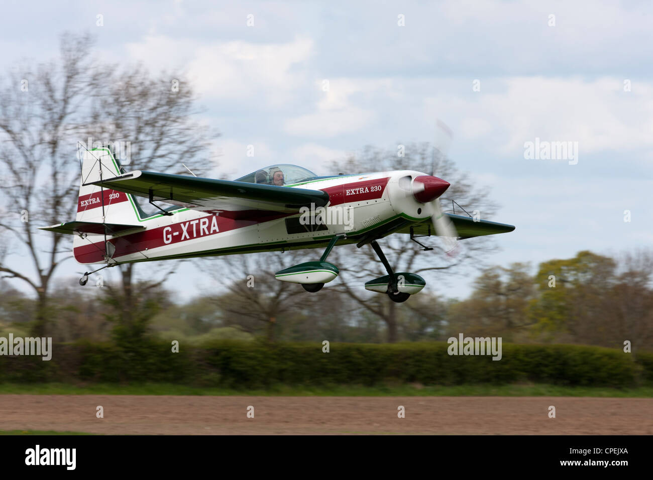 Extra EA230 G-XTRA landing at Breighton Airfield Stock Photo - Alamy