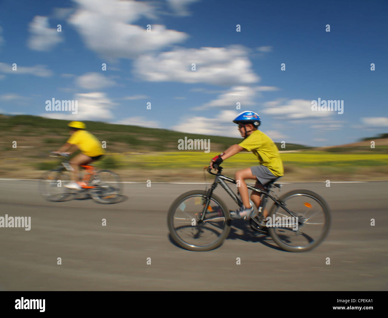 a boy riding a bicycle Stock Photo - Alamy