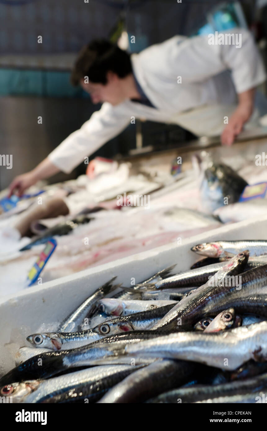 fish dealer working Stock Photo - Alamy