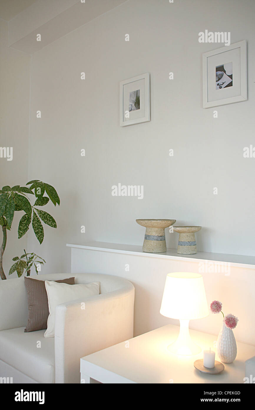 Table Lamp On Side Table Beside Easy Chair Stock Photo - Alamy