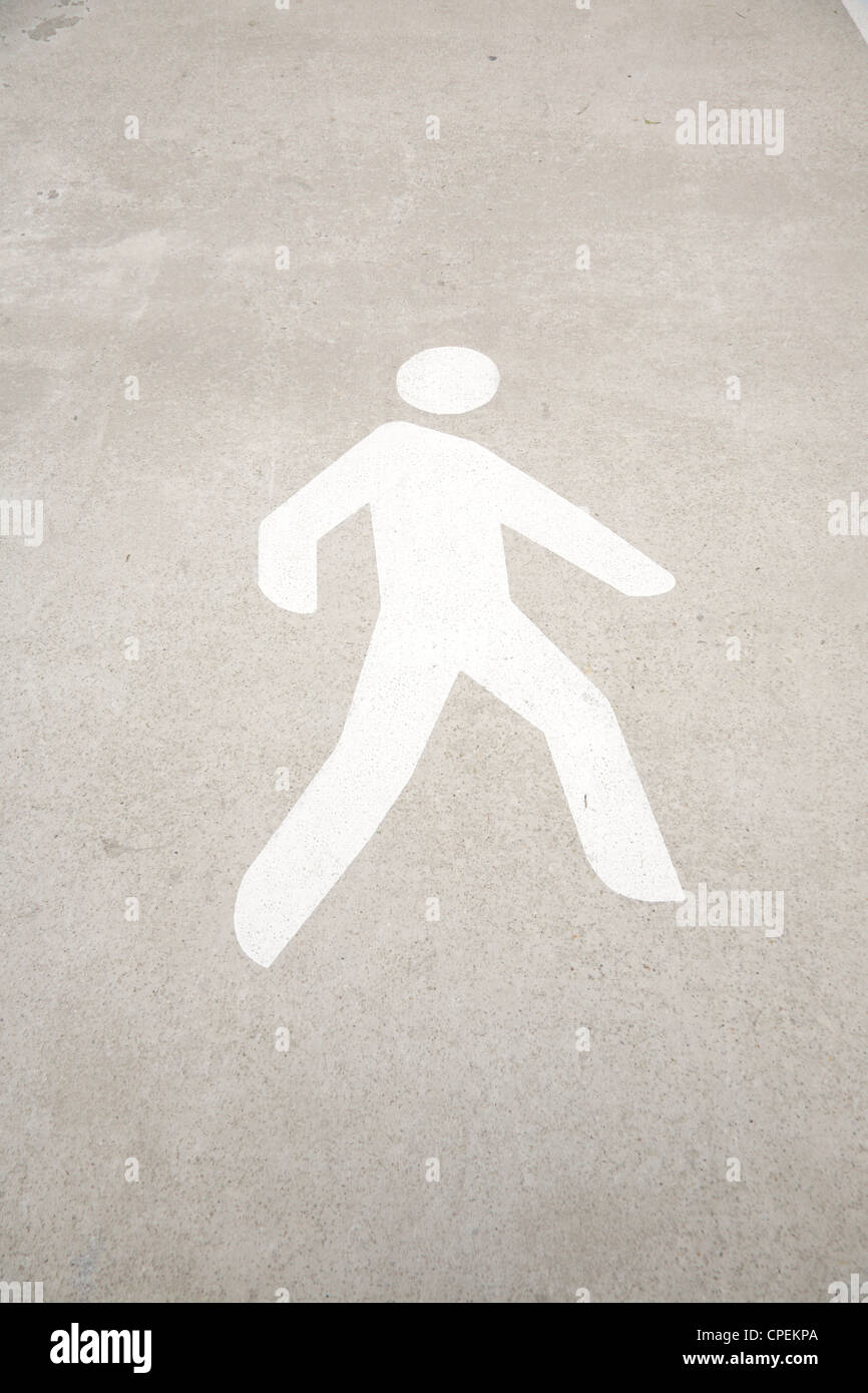 pedestrian lane sign on the asphalt ground Stock Photo - Alamy
