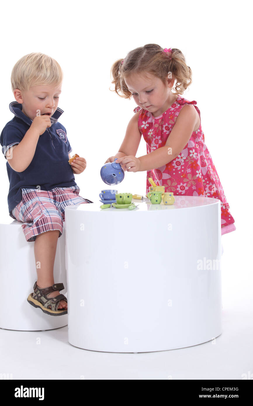 Children having tea together Stock Photo - Alamy