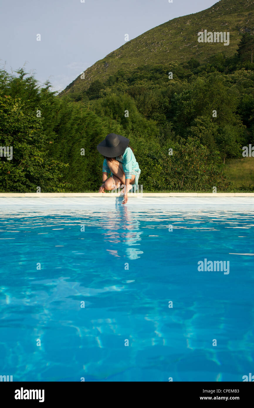 woman barefoot at swimming pool border in Asturias Spain Stock Photo ...