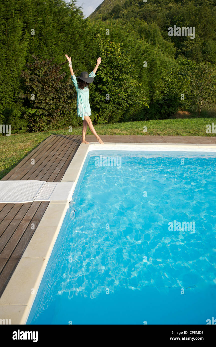 woman barefoot at swimming pool border in Asturias Spain Stock Photo ...